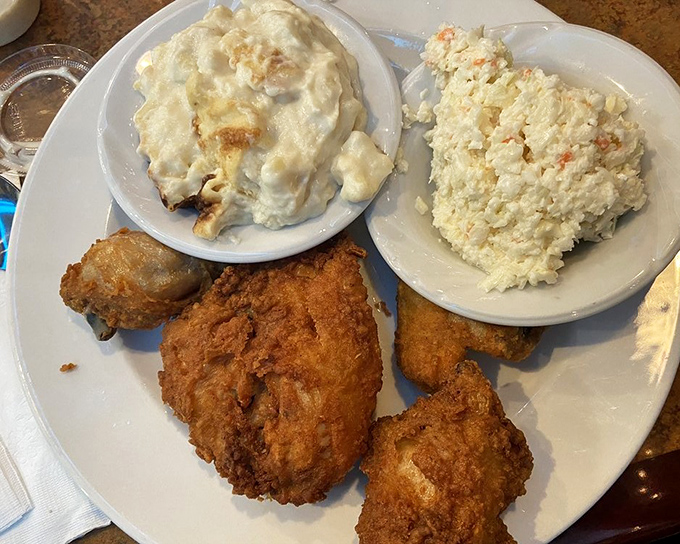 Southern comfort meets Pennsylvania appetite&mdash;this golden-fried chicken platter with creamy sides is what happiness looks like at dinnertime.
