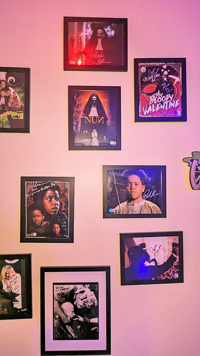 Autographed horror movie stills create a gallery of nightmares, from "The Nun" to classic slasher films.