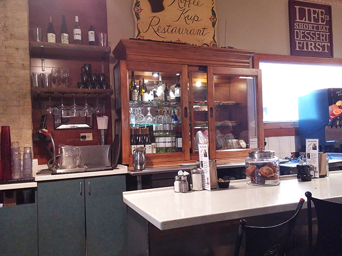 Vintage cabinets and "Life is Short, Eat Dessert First" signs remind you that some wisdom is timeless, especially when pie is involved.