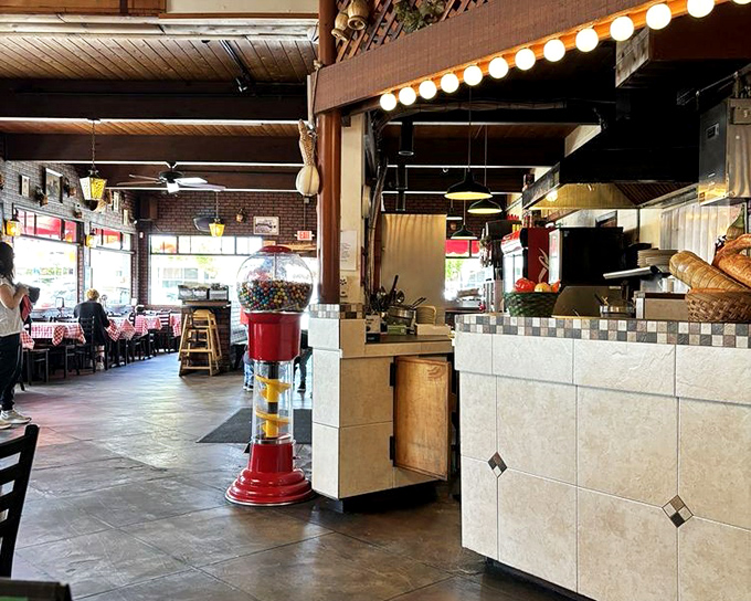 Open kitchen views reveal pizza wizards casting delicious spells with flour, sauce, and pure magic.