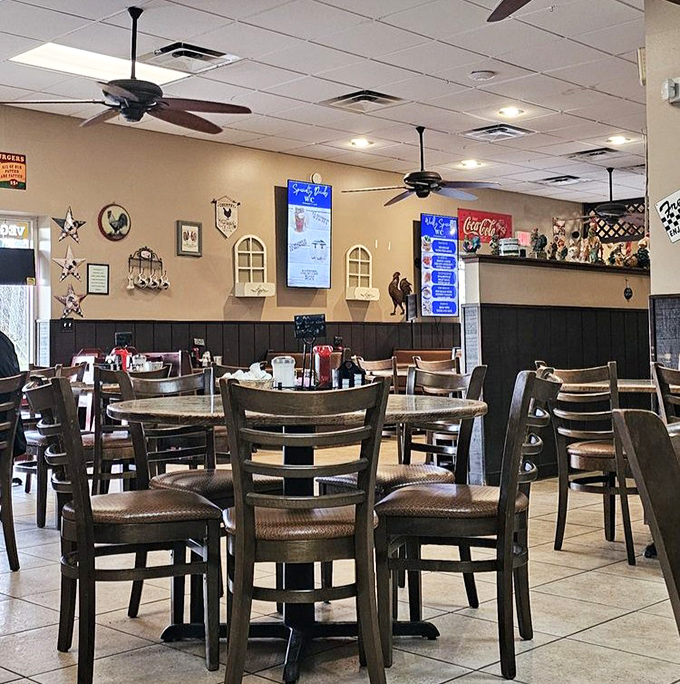 Country-chic décor with lattice dividers and mounted deer creates the perfect backdrop for comfort food consumption. Hunting lodge meets breakfast haven.