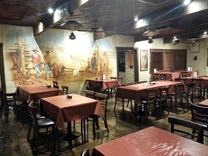 Western murals that don't feel kitschy somehow, watching over diners who've come for the steak but stay for the atmosphere.