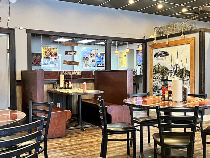 Simple wooden tables and chairs say "we're serious about seafood, not fancy furniture." The focus here is firmly on what's on your plate.