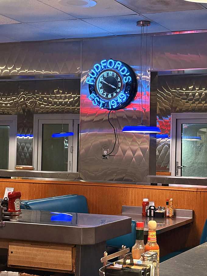 That neon clock isn't just telling time—it's reminding you that good food is timeless. Especially at 3 AM.