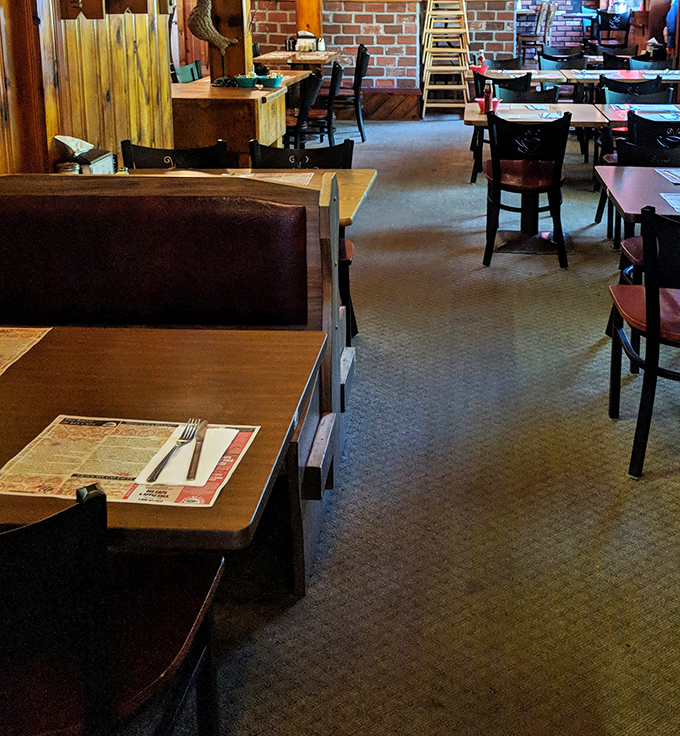 Booths designed for comfort and conversation&mdash;where locals have been solving world problems over coffee since before smartphones existed.