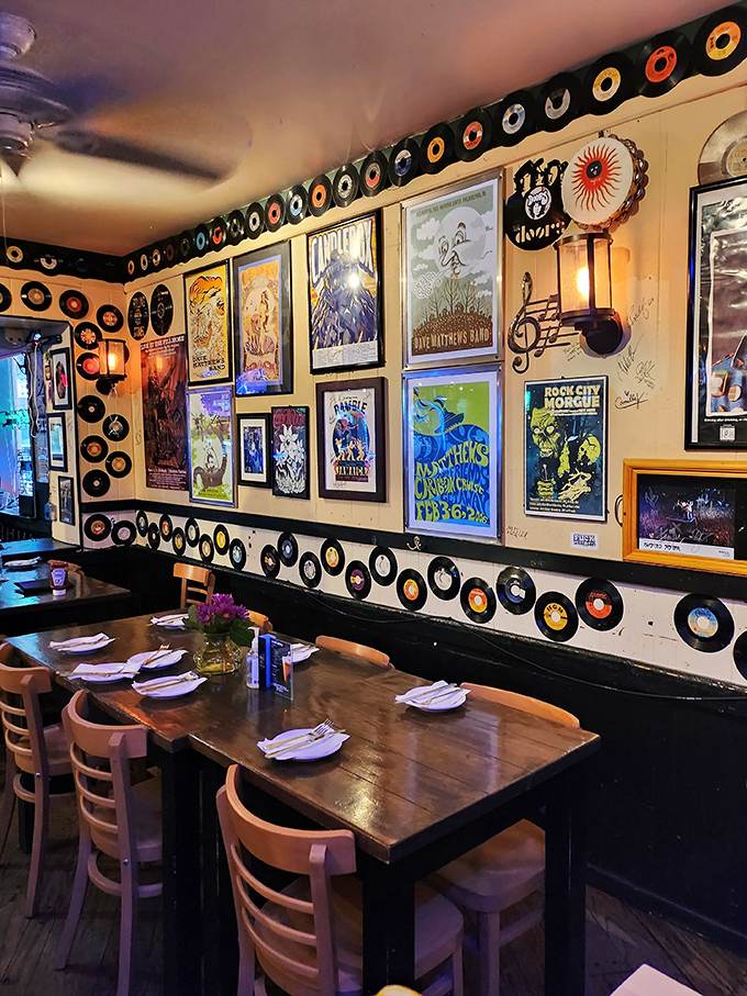 Concert posters and vinyl records transform dining into a multisensory experience where music history meets food worth remembering.