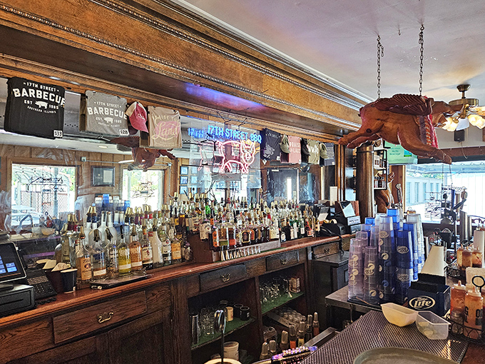 The wooden bar tells stories of countless elbows, animated conversations, and glasses raised to life's simple pleasures.