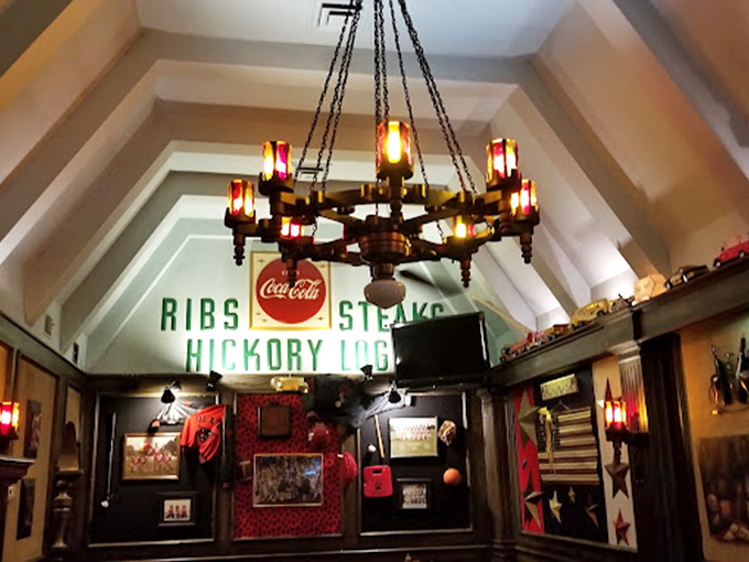 Multiple dining spaces feature exposed beams and cozy lighting, creating intimate corners perfect for savoring every smoky bite.