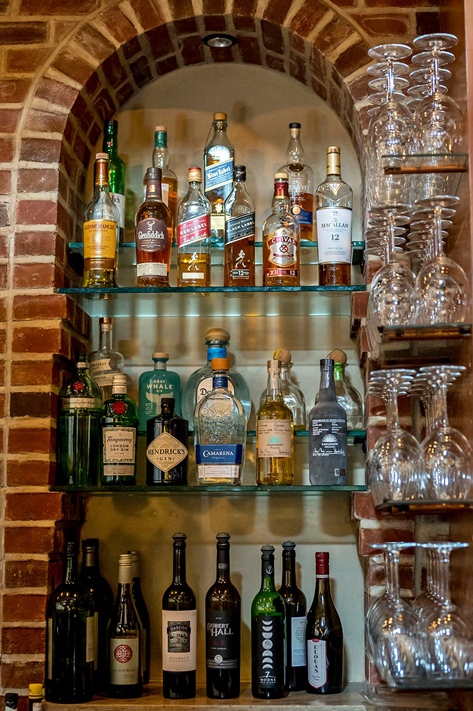Behind this brick archway lies liquid happiness &ndash; a carefully curated collection of spirits waiting to become your next favorite cocktail.