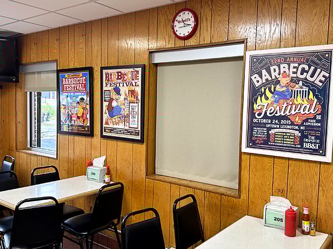 The wood-paneled walls showcase Barbecue Festival posters like fine art &ndash; in Lexington, these aren't just events, they're annual pilgrimages for smoke-seekers.