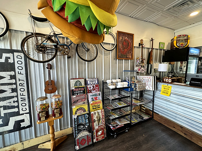 A bicycle suspended from the ceiling and that giant burger hat &ndash; quirky d&eacute;cor that matches the food's personality.