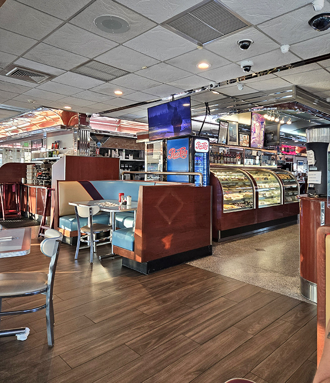 The dessert case beckons like a sweet siren, displaying homemade treats that make choosing just one nearly impossible.