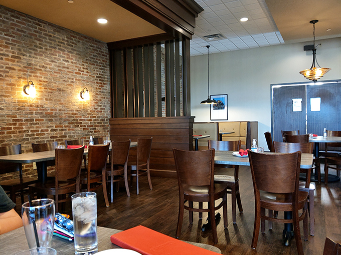 Exposed brick walls and thoughtful lighting create dining nooks where first dates become second dates and regular Tuesdays become special occasions.