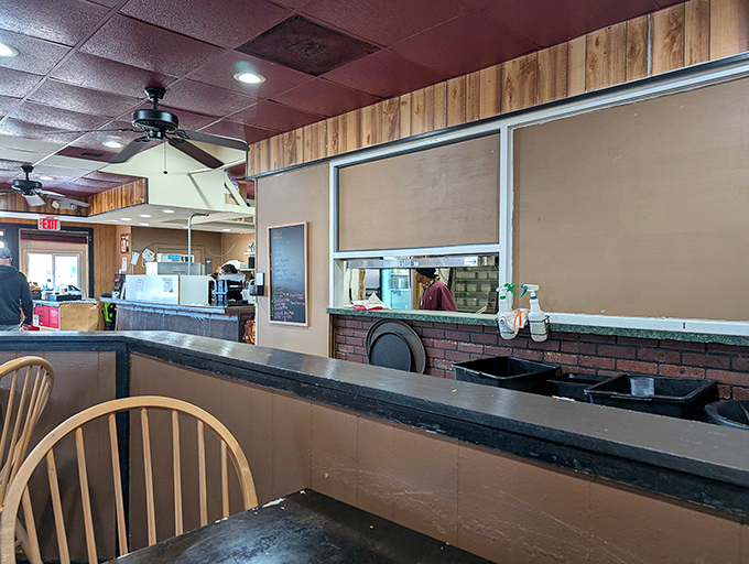 A glimpse into the restaurant's interior &ndash; where ceiling fans gently stir the aromas of soul food into a symphony that makes waiting for your order deliciously torturous.