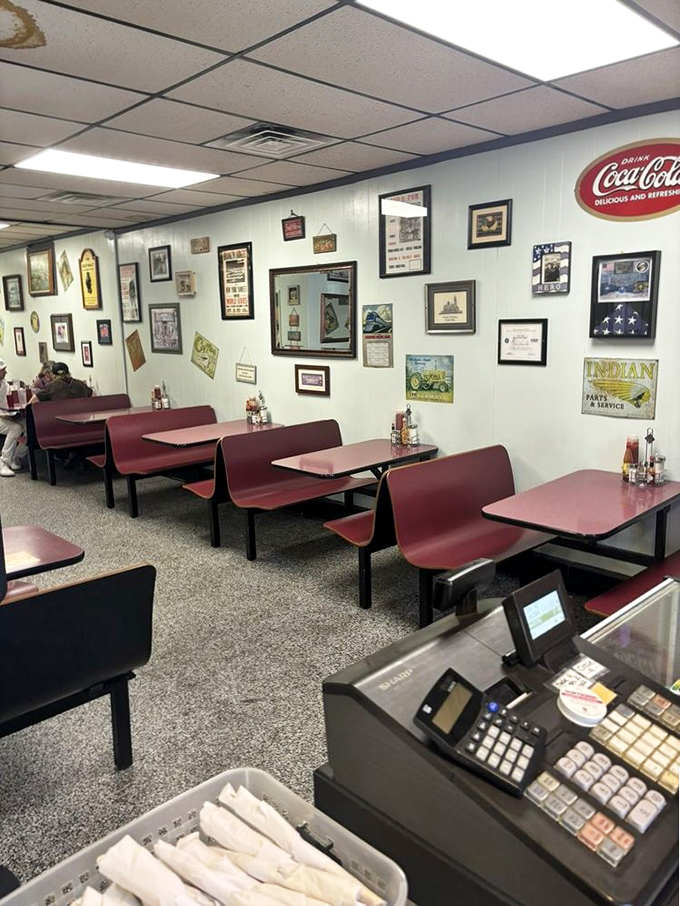 The dining room's burgundy booths have witnessed countless conversations, celebrations, and first dates over plates of Southern comfort.