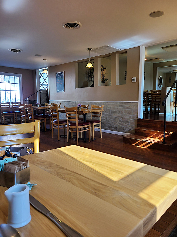 Warm wood tones and natural light create the perfect backdrop for lingering conversations and second cups of coffee.