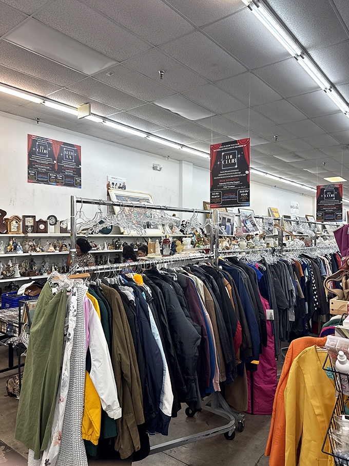 Color-coded clothing racks create a rainbow road to bargain bliss. Those red signs promise even deeper discounts&mdash;be still my thrifty heart!