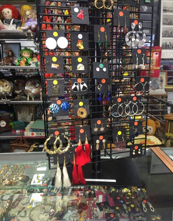 Jewelry displayed like archaeological findings. Those colorful tags are modern-day treasure maps leading to accessories with previous lives.