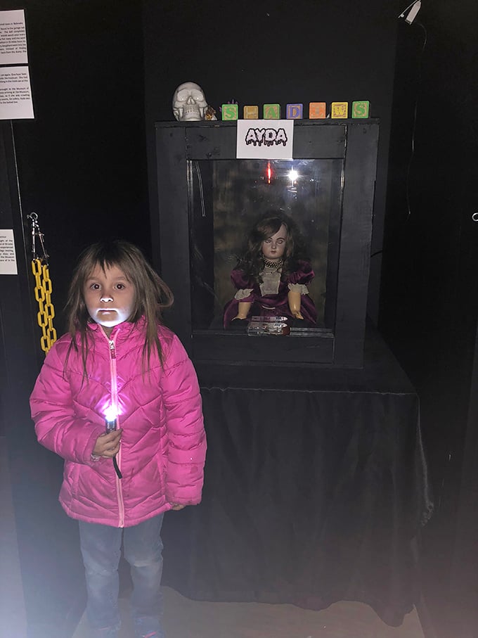 Young explorers brave the darkness to meet Ayda face-to-face. That flashlight isn't just for seeing&mdash;it's emotional support equipment.