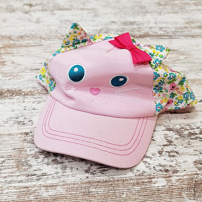 This adorable pink cap costs less than a kids' meal but will generate approximately one thousand times more joy.