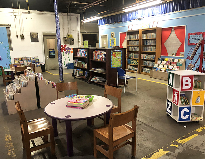 A cozy reading nook where young minds can test-drive their potential purchases. The ABC blocks in the corner remind us where all great reading journeys begin.