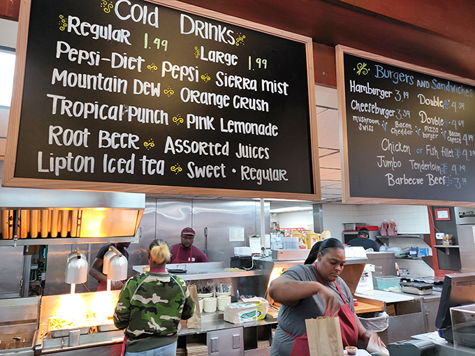 The open kitchen offers dinner and a show&mdash;skilled hands preparing the dishes that have made Benjamin's a Dayton institution for decades.