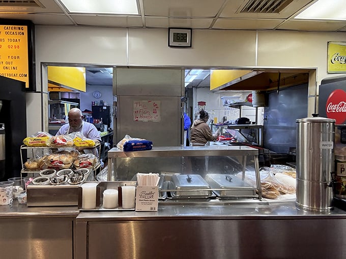 The kitchen pass&mdash;where culinary magic happens with choreographed precision that would impress Broadway directors.