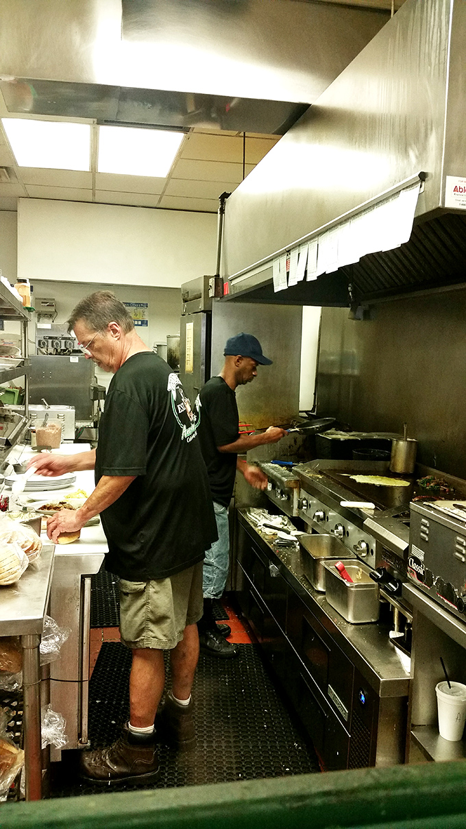 Behind-the-scenes ballet where short-order wizards transform simple ingredients into the comfort food that keeps Jacksonville coming back.