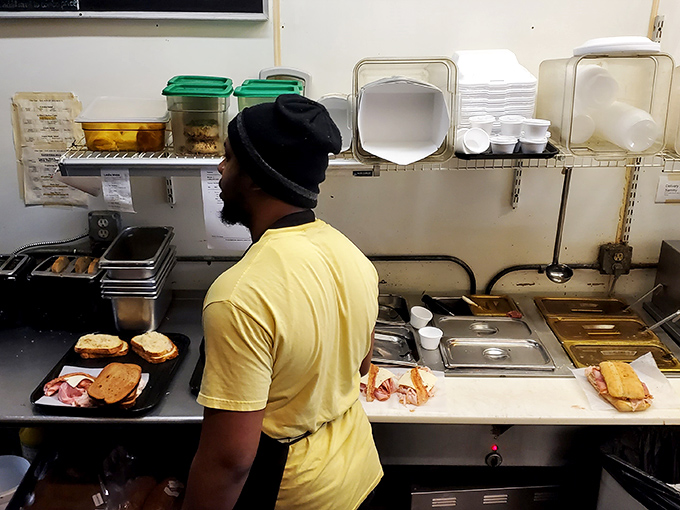 The kitchen – where sandwich magic happens with the focused precision of a NASA launch but with tastier results.