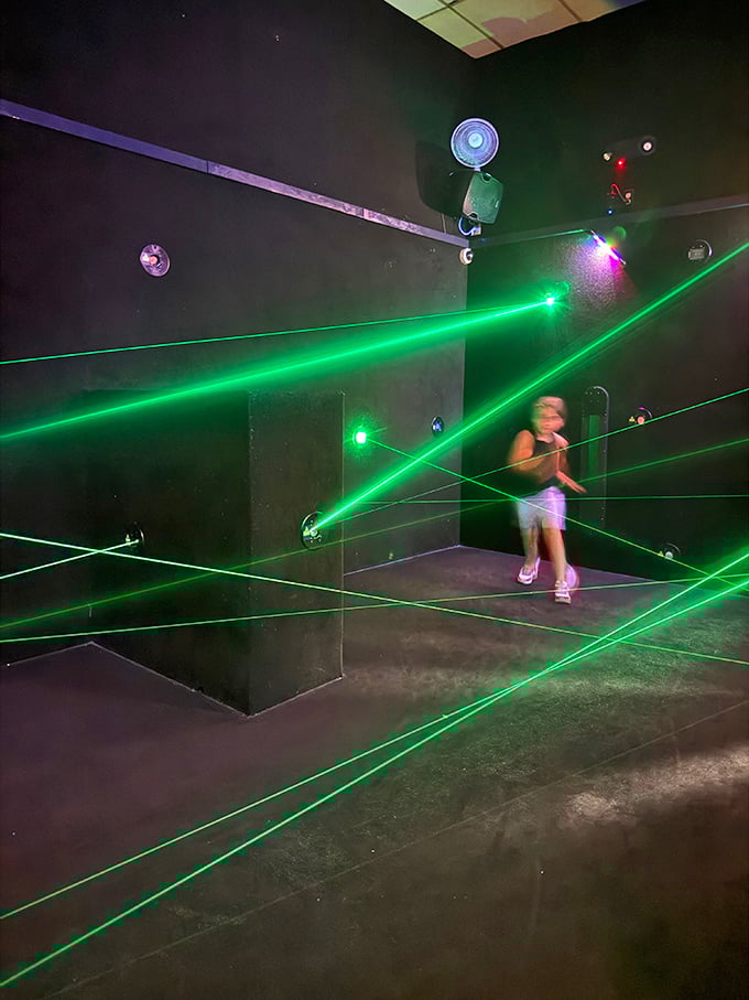 Green laser beams create a spy movie obstacle course that makes everyone feel impossibly cool.
