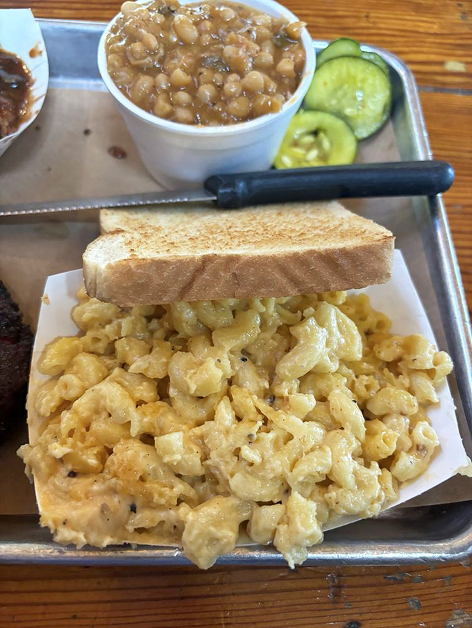 Mac and cheese so creamy it should be illegal in at least seven states. Those baked beans are its partners in delicious crime.