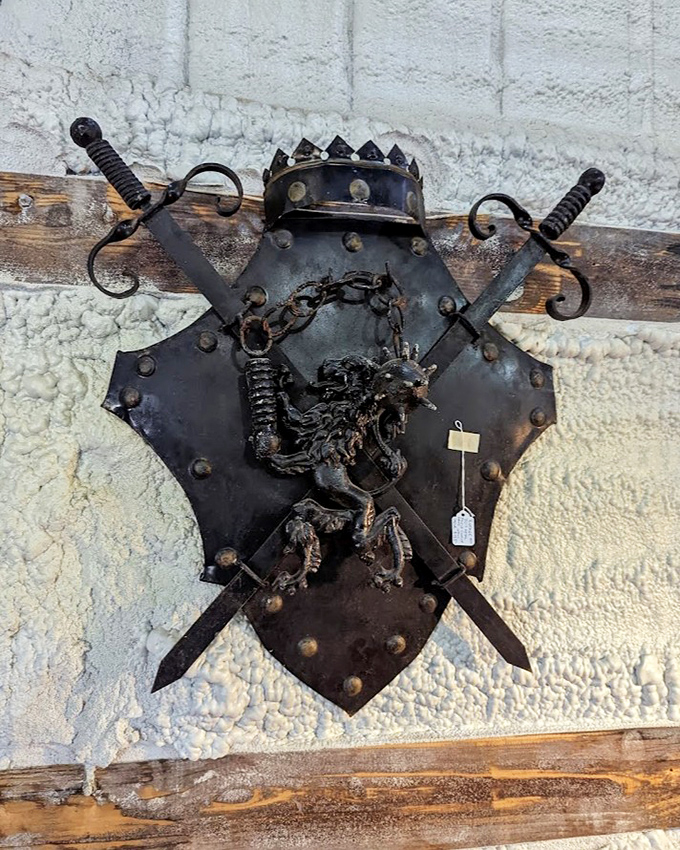 Medieval meets metal in this coat of arms. Perfect for that empty wall space that's been begging for something more interesting than a family photo.