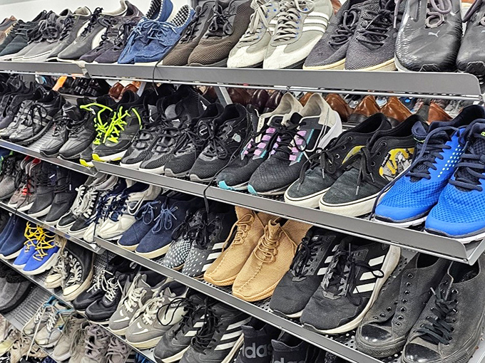 Men's shoes lined up like soldiers ready for duty&mdash;some barely worn, as if their previous owners discovered comfort matters more than style.