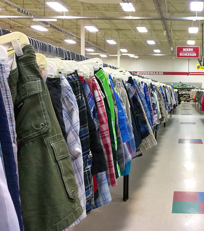 The men's shorts section: where fashion meets function in a glorious spectrum of plaids, khakis, and unexpected greens.