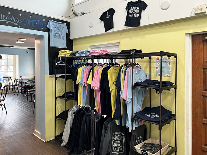 The merch wall proves that bacon worship isn't just a lifestyle&mdash;it's fashion statement worthy of wearing proudly across your chest.