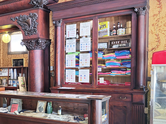 Behind these wooden cabinets lie menus of yesteryear and merchandise that lets you take a piece of Kissner's home.