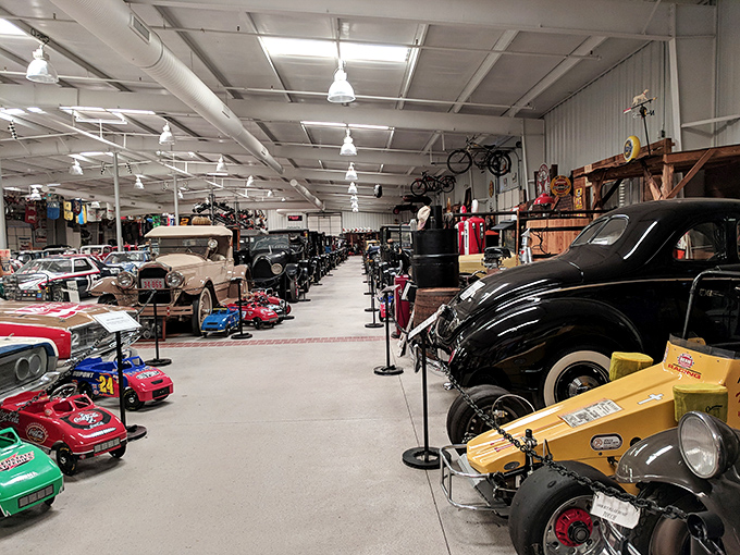 Art deco meets automotive excellence in this stunning cream-colored convertible from yesteryear.