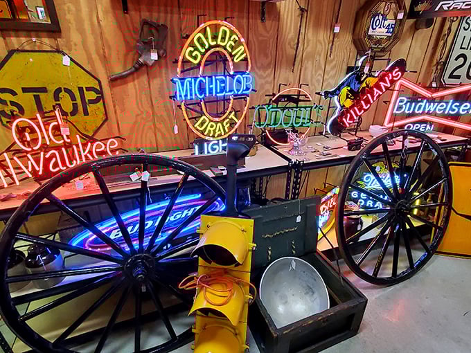 Neon beer signs cast their electric glow across wagon wheels and traffic lights—the perfect man-cave décor for those who prefer their nostalgia illuminated.