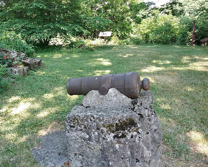 An antique cannon rests on the castle grounds, presumably for when the neighbors got too noisy or property taxes became unreasonable.