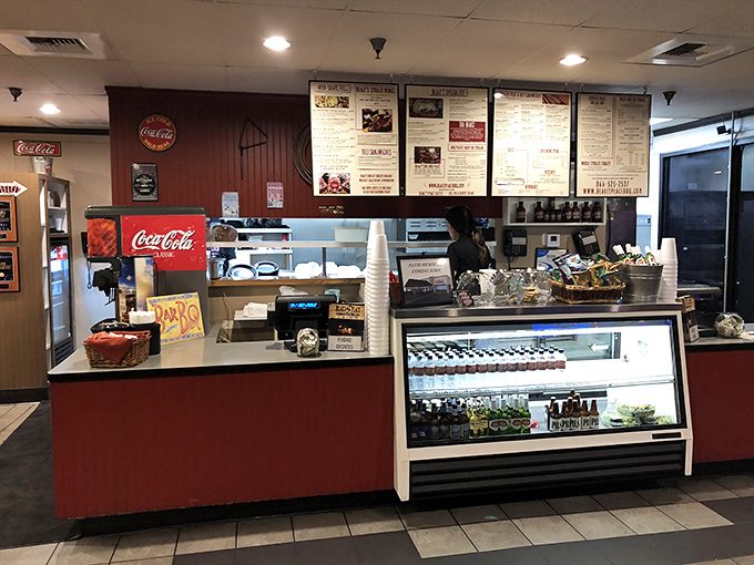 The counter of dreams, where friendly staff stand ready to fulfill your deepest barbecue desires without judgment, no matter how much you order.