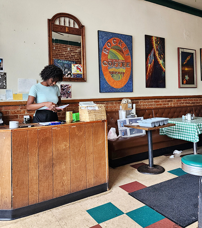 The beating heart of breakfast operations, where orders are called and coffee is poured with the efficiency of a well-oiled machine.