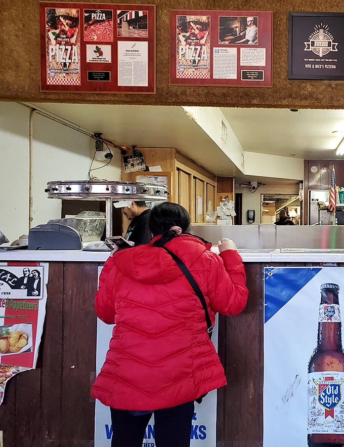 Where pizza dreams come true. The framed articles on the wall aren't bragging – they're documentation of a culinary landmark.