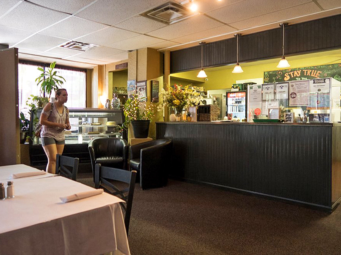 The dining room's understated elegance says "we care more about what's on your plate than hanging chandeliers." My kind of priority system.