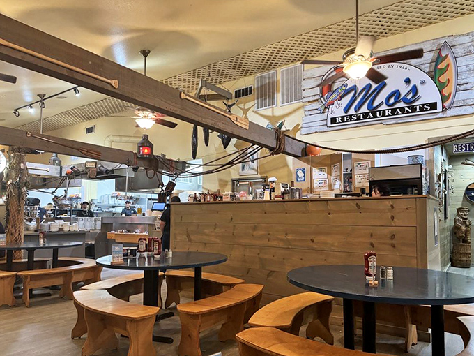 Wooden benches and blue-topped tables create that perfect "I've discovered a local gem" atmosphere. The kind of place where calories don't count because you're on vacation.