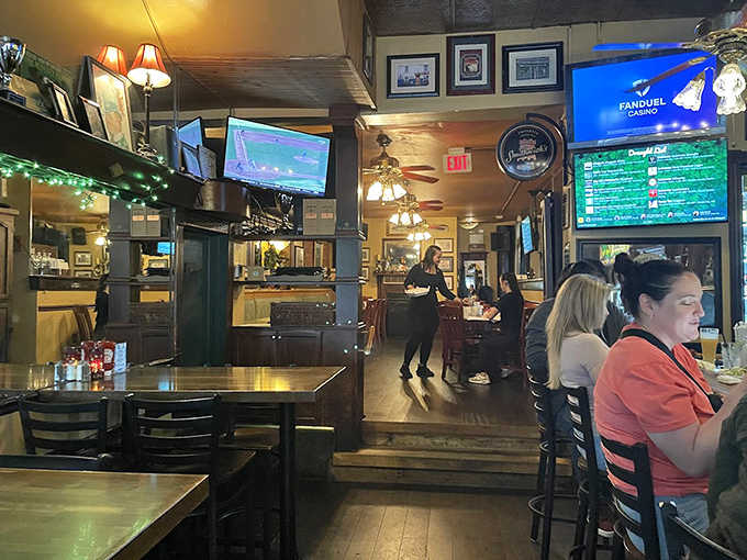 The dining room buzzes with conversation and clinking glasses &ndash; that perfect pub energy where everyone feels like a regular.