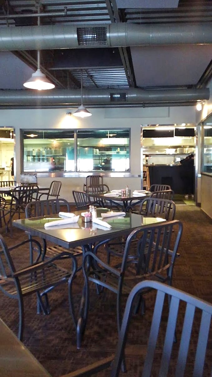 Clean lines, open kitchen views, and thoughtfully arranged seating&mdash;the dining room feels like someone actually cared about your comfort while designing it.