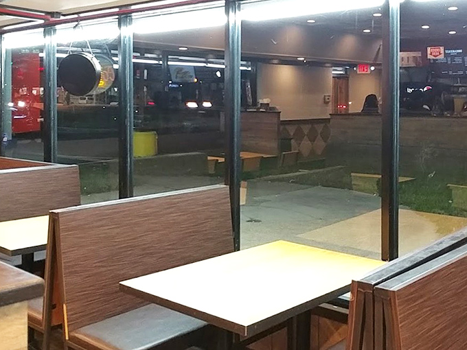 Simple seating with a view to the outside world. While you eat, passersby wonder why you're smiling so much.