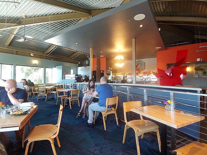 The dining room balances casual comfort with thoughtful design&mdash;where conversations flow as easily as the Oregon wines being poured.