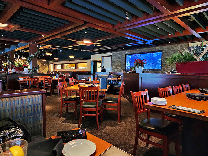 Thoughtful design creates intimate dining spaces within the larger room. Every table feels like the best seat in the house.