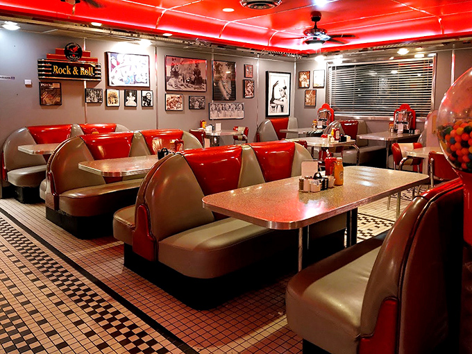 Red booths invite lingering conversations over bottomless coffee, while rock and roll memorabilia watches over diners like approving ancestors.